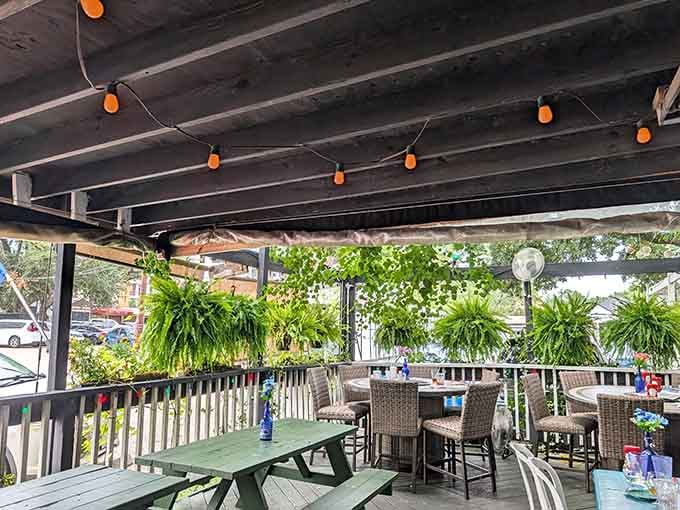 The patio offers Houston dining with a fantasy twist, where hanging plants meet string lights perfectly.