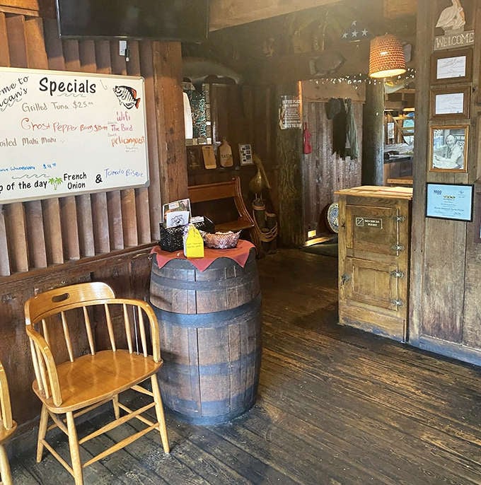 Rustic barrels and wooden details at the host station set the tone for your visit &ndash; casual, welcoming, and delightfully unpretentious.