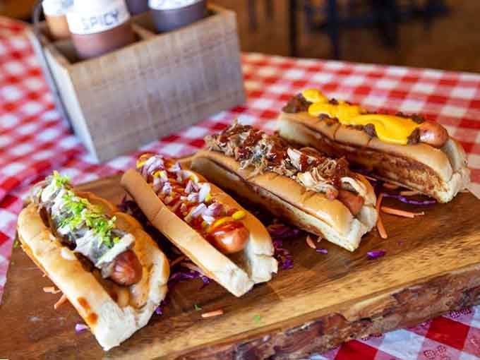 Hot dogs getting the royal treatment, proving that even the humblest foods can be transformed into something worth writing home about.