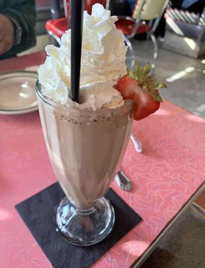 Milkshakes crowned with whipped cream towers that require strategic planning to consume.