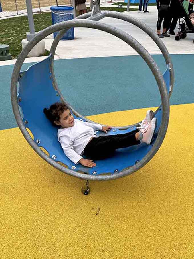Circular swings offer a cozy spot to rest between adventures, or just spin until the world becomes one happy blur.