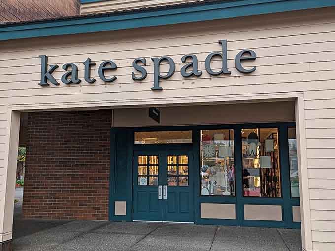 Kate Spade's cheerful storefront promises handbags and accessories that'll outlast your current car and possibly your mortgage too.
