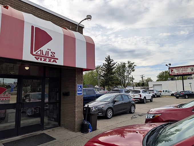 The corner location makes Loui's easy to spot, with that distinctive pink striping guiding you home to dinner.