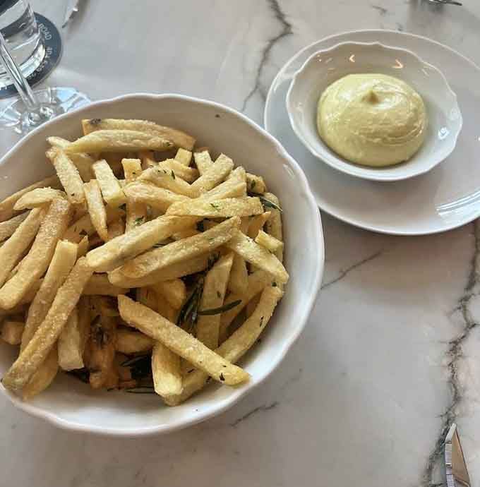 Golden fries with aioli that could make a vegetarian reconsider their life choices, or at least their dinner plans.