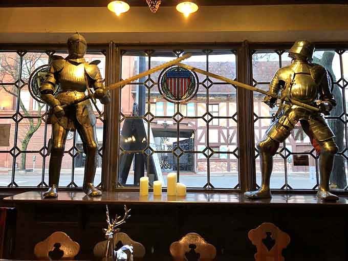 Authentic suits of armor flank the windows, standing eternal watch over diners enjoying their schnitzel and spaetzle below.