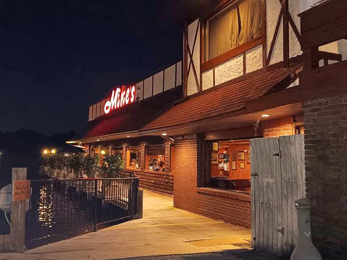 Mike's glowing sign at night is like a lighthouse guiding hungry souls to crab-filled salvation and happiness.