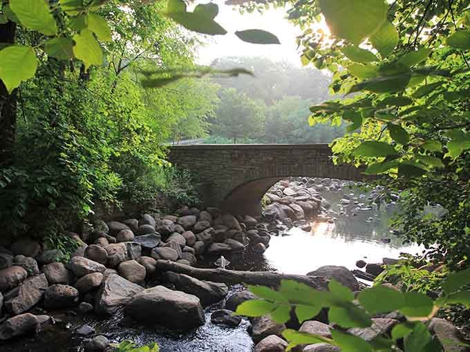 The historic stone bridge arches gracefully over the creek, looking like it wandered in from a European postcard somehow.