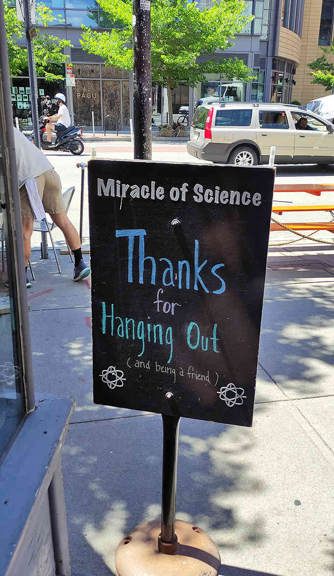 That sidewalk sign's friendly message proves good manners never go out of style, even in brainy Cambridge neighborhoods.