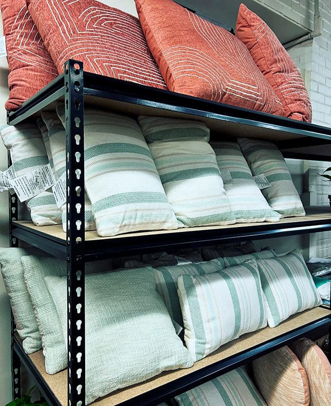 Decorative throw pillows in every color and pattern imaginable, ready to refresh your couch for pocket change.