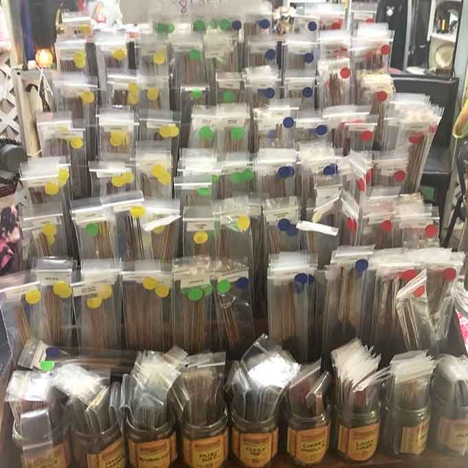 Incense sticks organized by color like an artist's palette, bringing zen to your home at flea market prices.