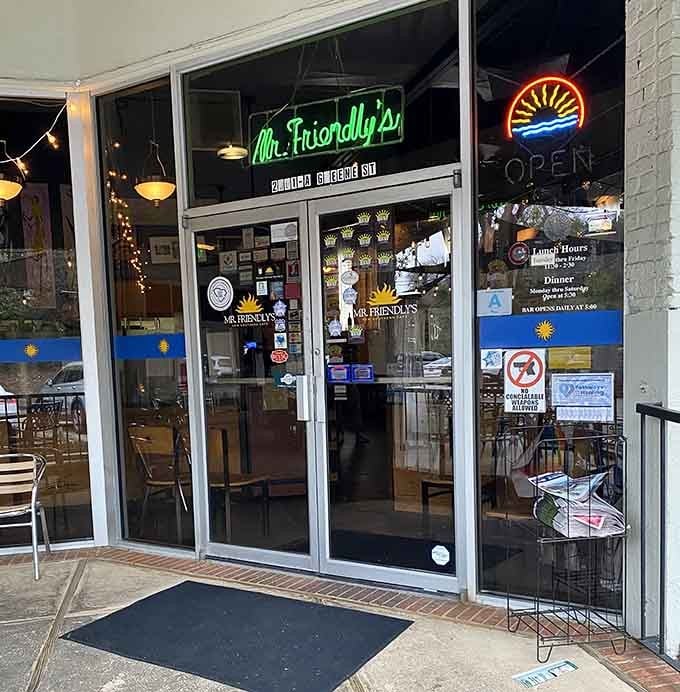 The welcoming entrance with its glowing neon sign promises good things await just beyond those doors on Greene Street.