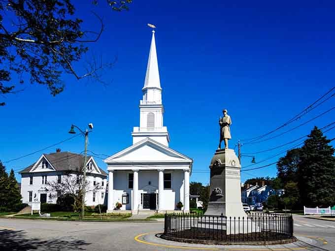 The Mystic Congregational Church towers over the town square with classic New England ecclesiastical elegance.