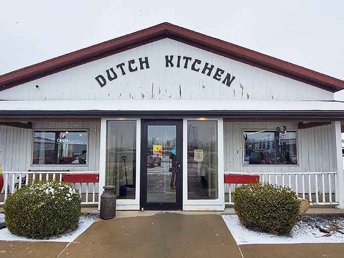 The Dutch Kitchen's simple white exterior promises hearty comfort food inside, no fancy architectural flourishes needed when the cooking speaks for itself.