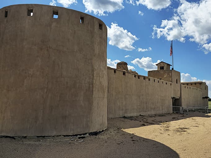 The imposing watchtower and thick adobe walls weren't just for show; they provided real security in an era when protection mattered immensely.
