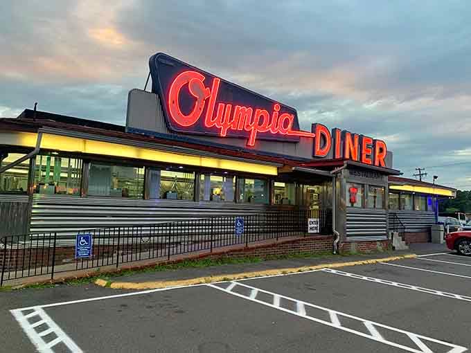 The exterior at dusk glows like a spaceship that landed specifically to feed hungry earthlings, mission accomplished nightly.