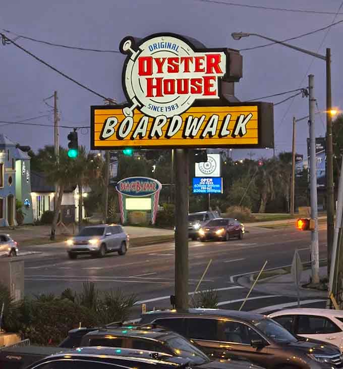 The sign glowing at dusk is like a lighthouse guiding hungry souls to their seafood salvation on the boardwalk.