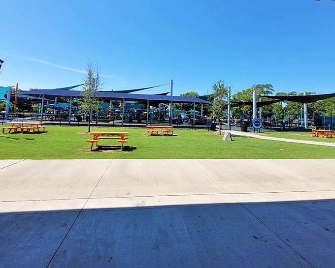Picnic tables with a view of the action, perfect for snacks and supervising simultaneously.