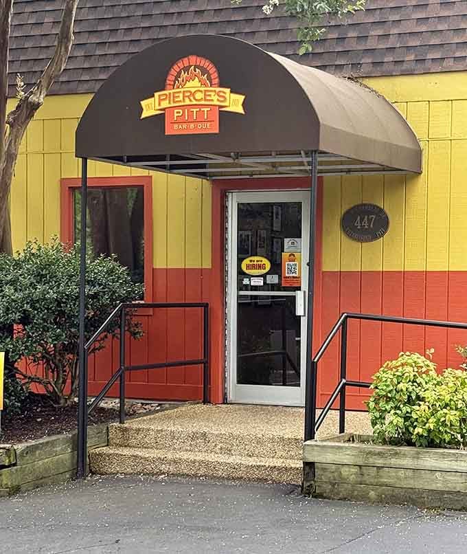 The welcoming entrance with its cheerful awning invites you to step inside and discover what all the local buzz is about.