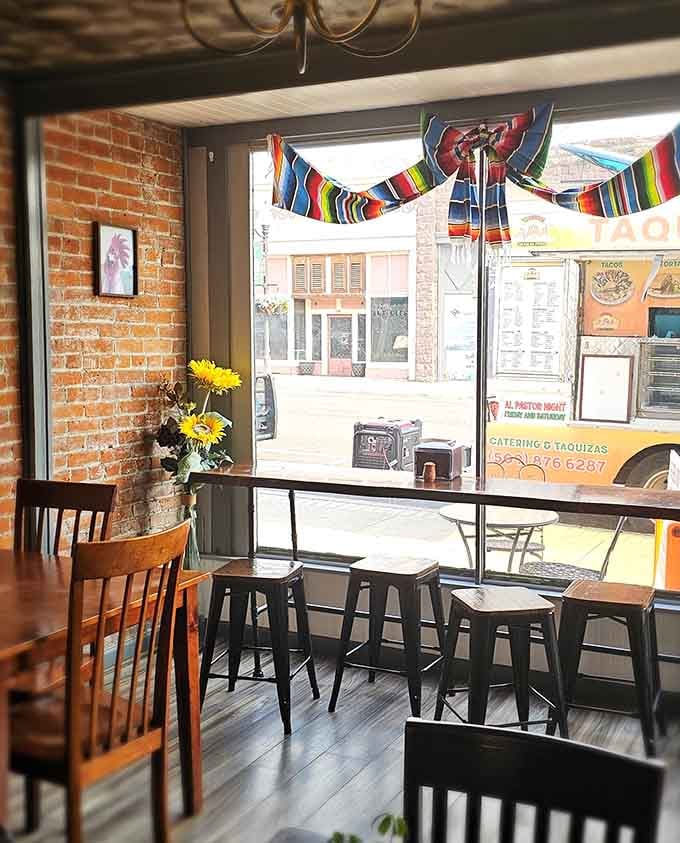 Colorful Mexican restaurant interior with festive decorations, because good food transcends geography and brings communities together.