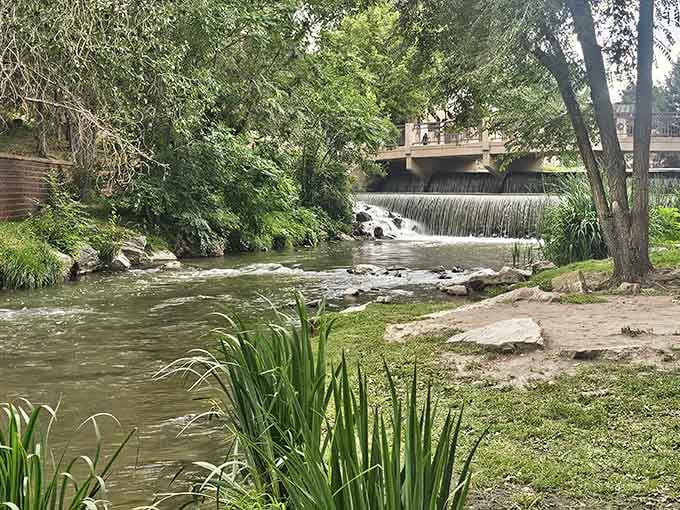 Natural waterways blend seamlessly with manicured paths, creating peaceful scenes that calm the soul instantly.