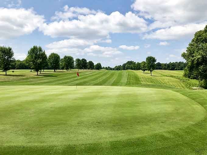 Perfectly manicured fairways stretch toward the horizon, tempting golfers to forget about their actual skill level.