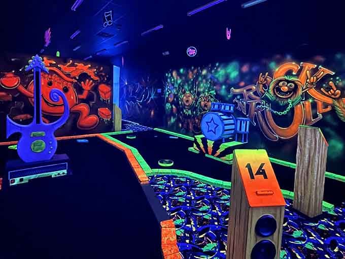 Hole fourteen features guitars and musical notes that practically vibrate with rock energy under the blacklights' glow.