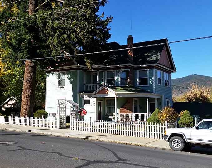 Victorian homes with white picket fences that look like they escaped from a Hallmark movie set.