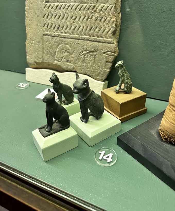 These bronze cat statues represent Bastet, because Egyptians worshipped cats centuries before the internet made it mandatory.