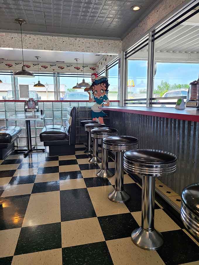 Window seats offering the best of both worlds: climate-controlled comfort inside with a perfect view of Route 66 life passing by.