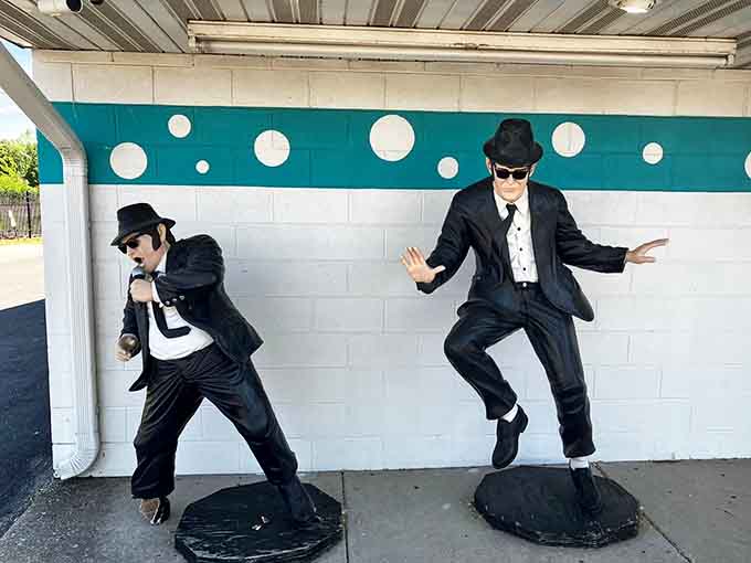 Life-sized Blues Brothers statues proving that even concrete can have soul when it's dressed in black suits.