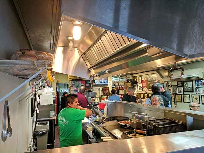 Where the real action happens, turning simple ingredients into the comfort food that feeds Birmingham's soul.