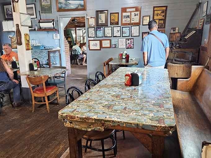 Long communal tables covered in nautical maps invite strangers to become friends over plates of Southern coastal perfection.