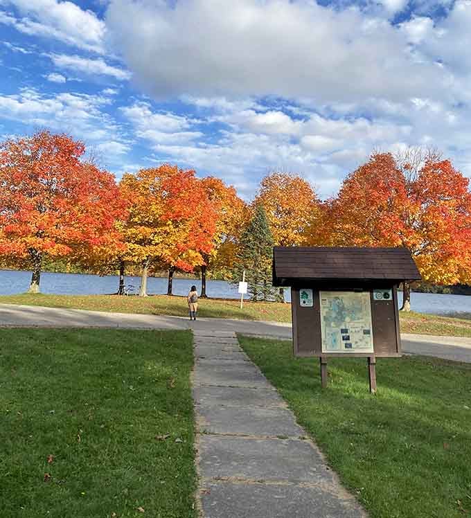 Information kiosks and autumn trees team up to help you plan your perfect day in this slice of paradise.