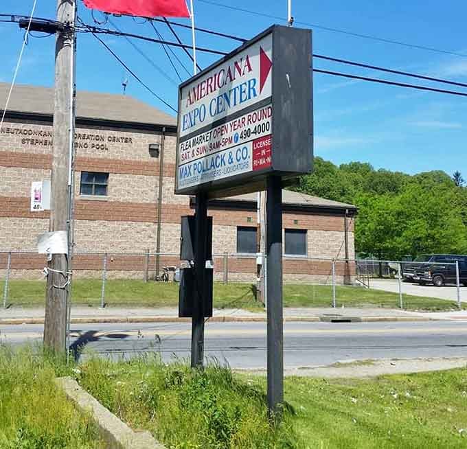 Roadside sign announcing treasure-hunting opportunities seven days a week. The siren call for bargain hunters throughout Rhode Island.