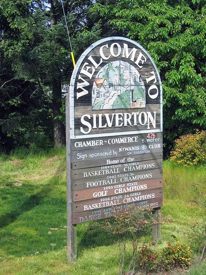 The welcome sign proudly displays the town's athletic achievements, because apparently Silverton excels at everything including sports championships.