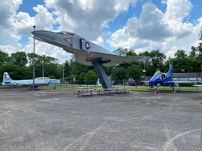 Outdoor displays where jets strike dramatic poses, making your neighborhood park's playground equipment look decidedly less impressive.
