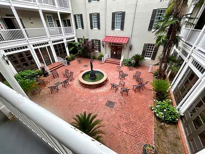 The St. James Hotel's courtyard feels like stepping into a secret garden. Brick pavers, wrought iron, and a fountain create an oasis of Southern tranquility.