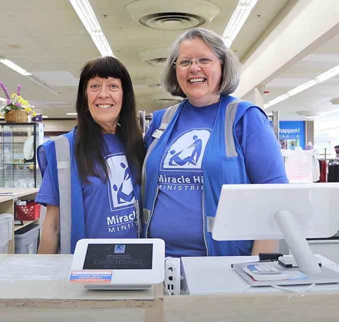 Friendly faces in blue shirts keeping this retail wonderland running smoother than a well-oiled thrift store shopping cart.