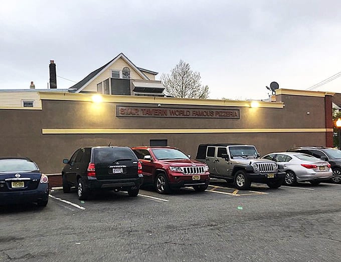 That full parking lot tells you everything you need to know about what's waiting inside this unassuming building.