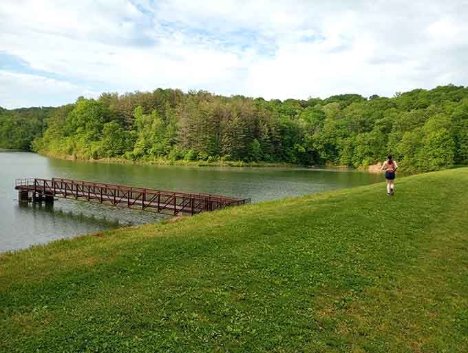 That fishing pier stretches into the lake like an invitation, promising tranquility and possibly dinner if you're lucky.