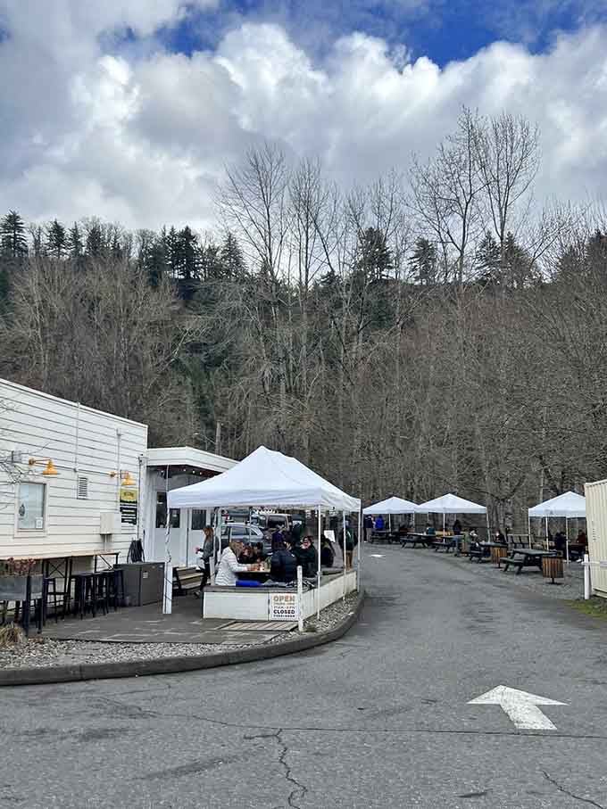 Even on cloudy days, those outdoor tents keep the good times and great food flowing steadily.