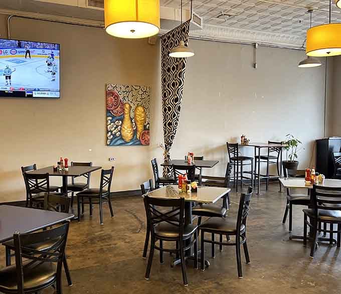 Inside Tallahatchie Gourmet, warm lighting and comfortable seating create the perfect backdrop for lingering conversations over plates that empty suspiciously quickly.
