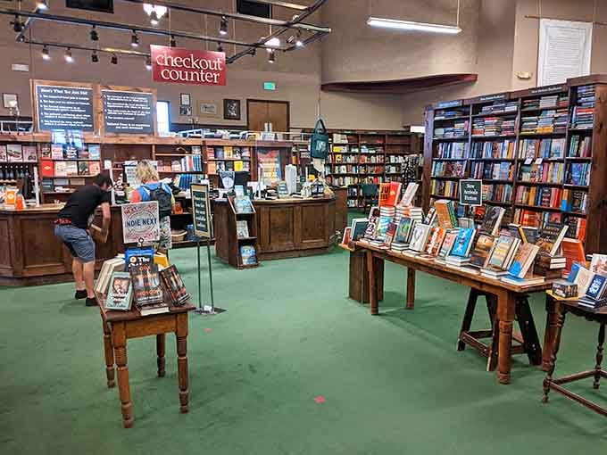 The checkout counter where good intentions meet reality and your book budget quietly weeps in the corner of your wallet.