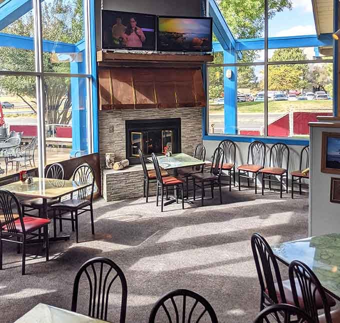 Large windows flood the space with natural light, creating an unexpectedly bright atmosphere for your unique dining adventure today.