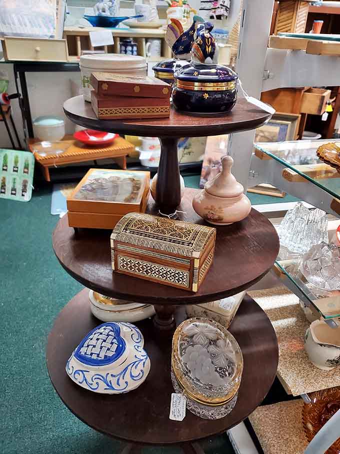 Tiered displays show off decorative boxes and ceramics, each piece with its own story waiting for someone to take it home.