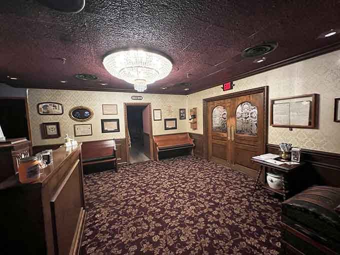 The lobby welcomes you with patterned carpets and period details, setting expectations high before you've even ordered anything.
