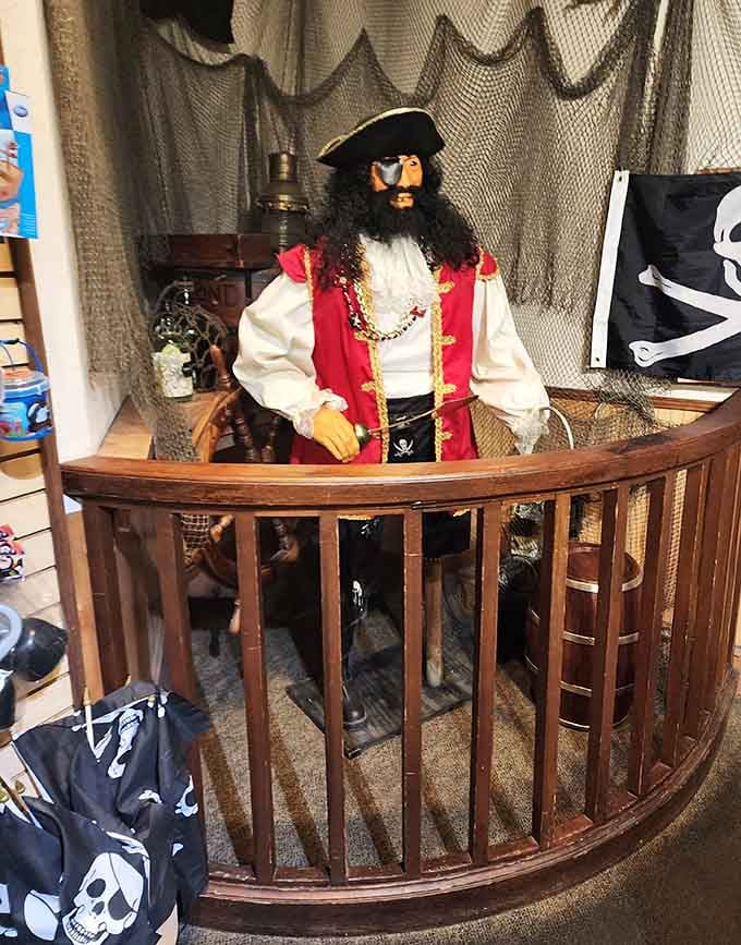 This pirate mannequin stands guard like he's still waiting for his ship to come in after all these years.