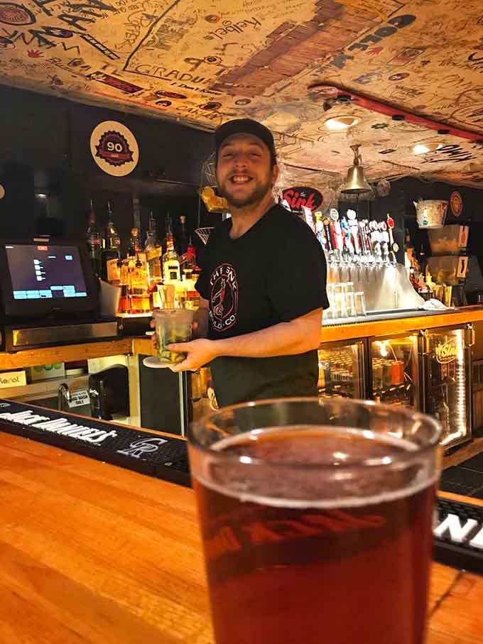 Your friendly bartender serves up cold ones under a ceiling that's witnessed nearly a century of Boulder stories and celebrations.