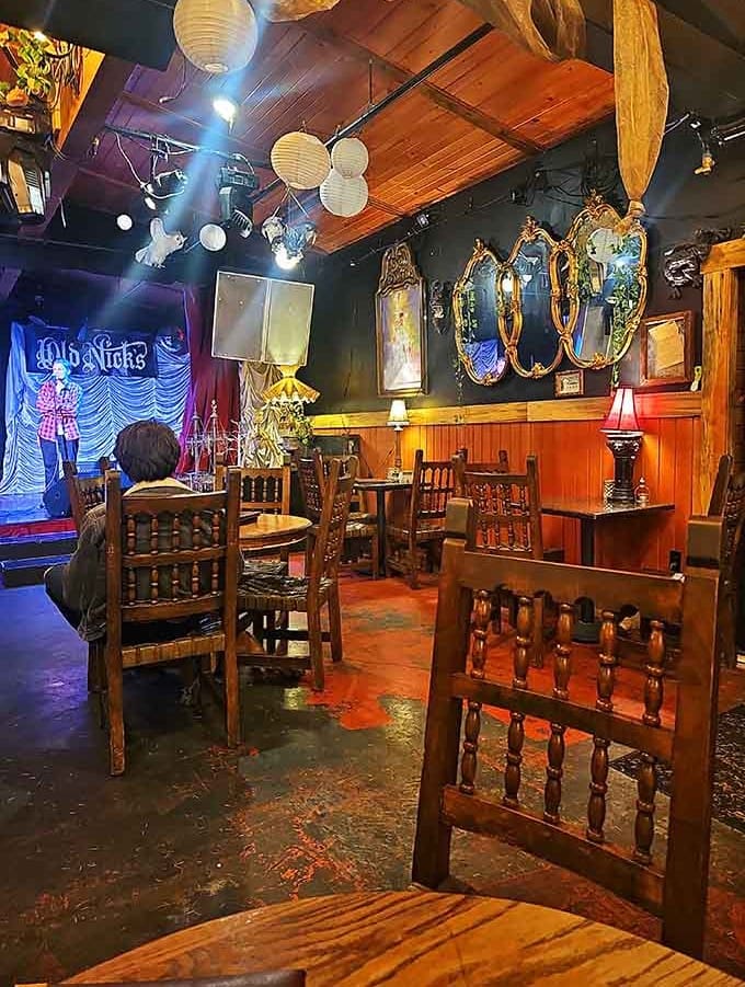 Paper lanterns and ornate mirrors at The Sparrow & Serpent create ambiance that's both cozy and theatrical.