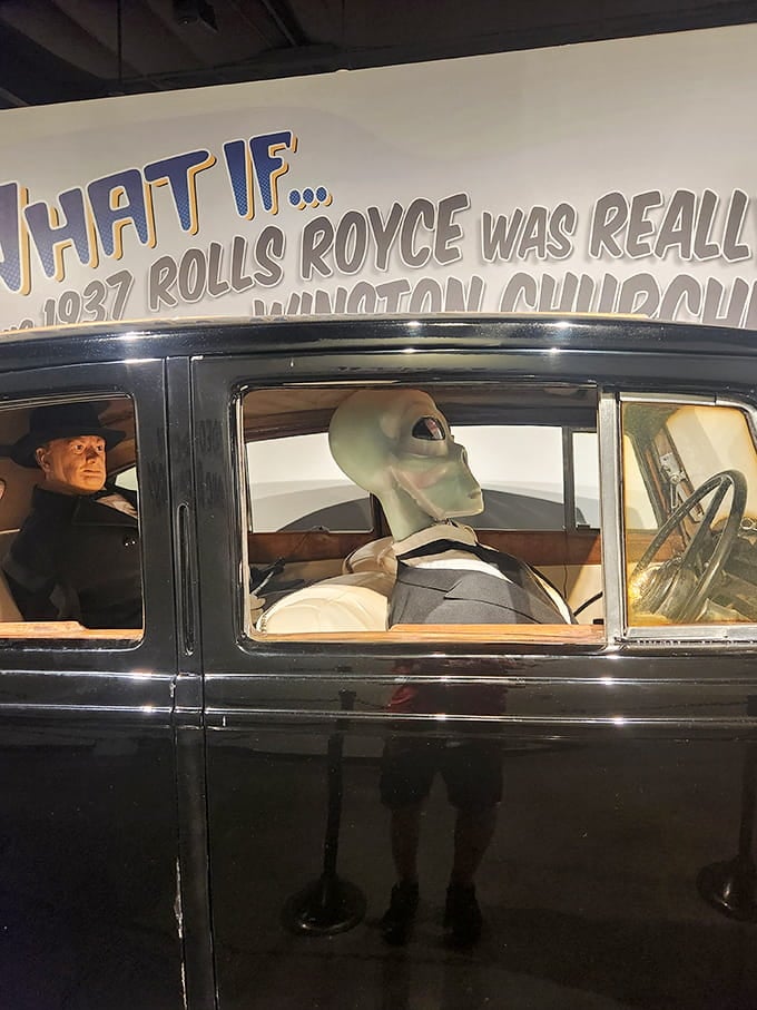 An alien chauffeur driving Churchill's Rolls Royce answers questions nobody asked but everyone secretly wondered about after midnight.